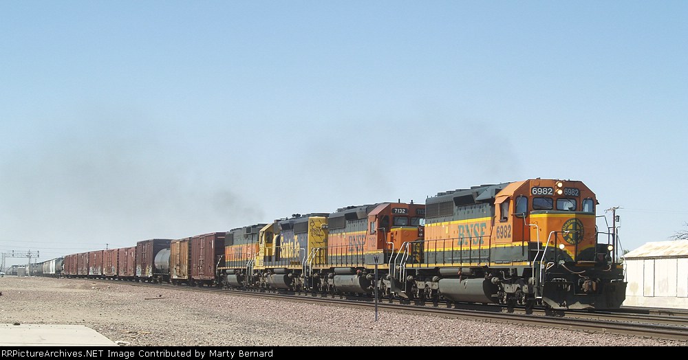BNSF 6982, 7132, 6352, and 341 Take Mixed Freight East
